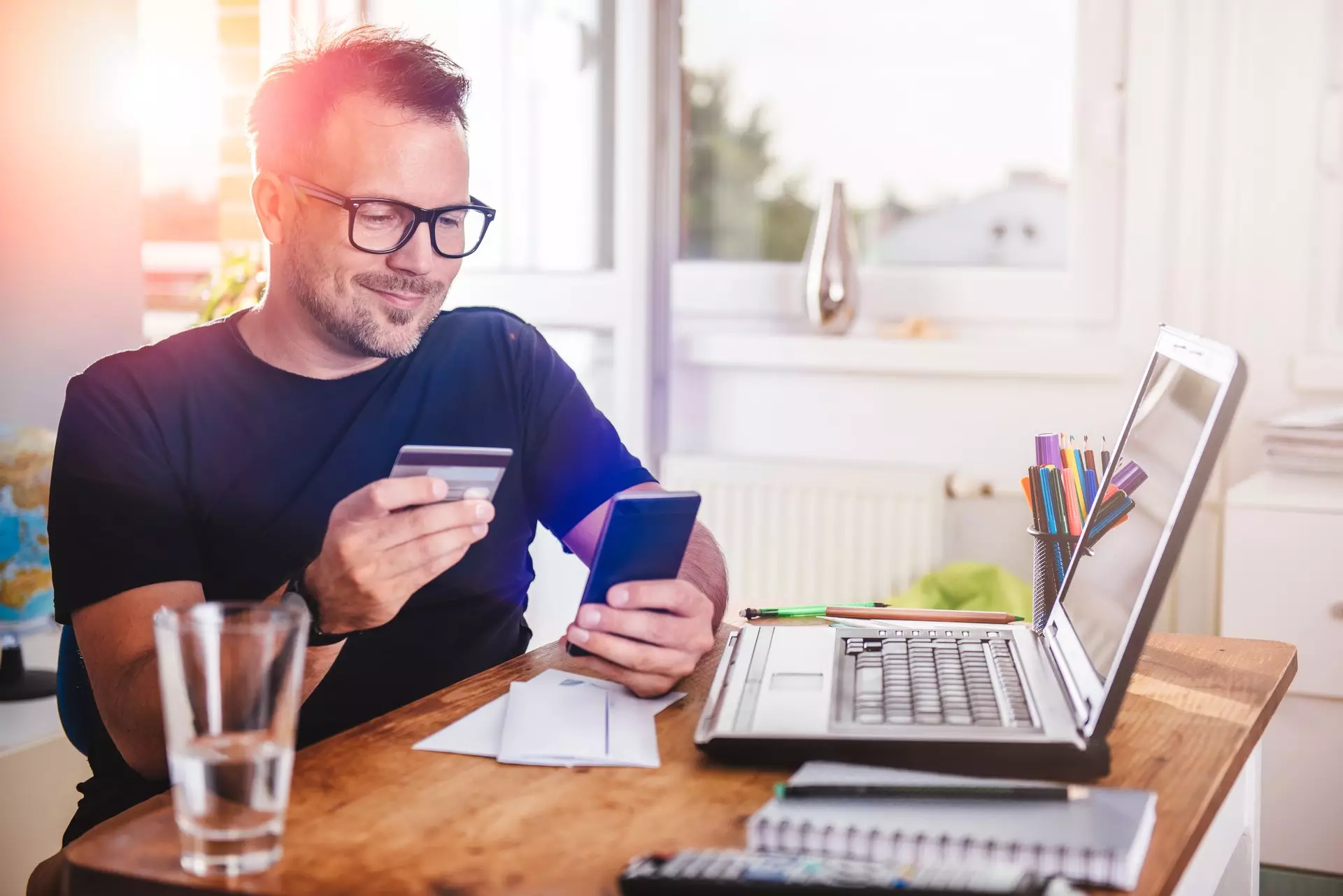 Man w Credit Card Computer