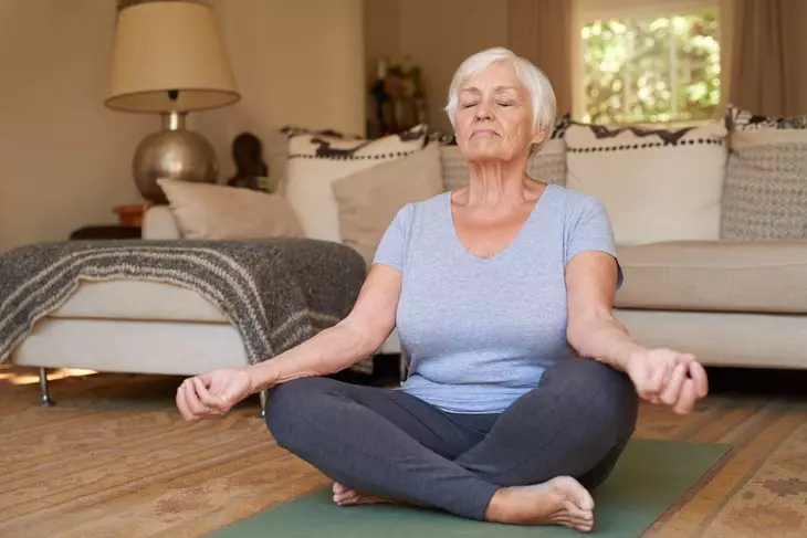 Senior meditating